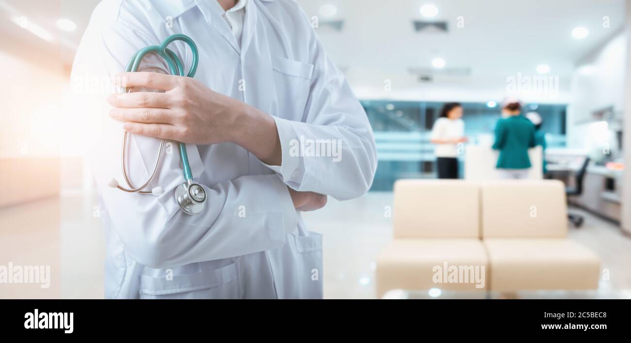 Medical Doctor Standing With Stethoscope and Arm Crossed Posing on ...