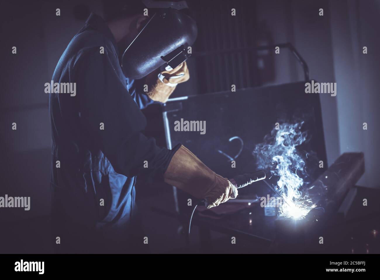 Technical Welder is Working Steel Welding in Assembly Workshop, Welder ...