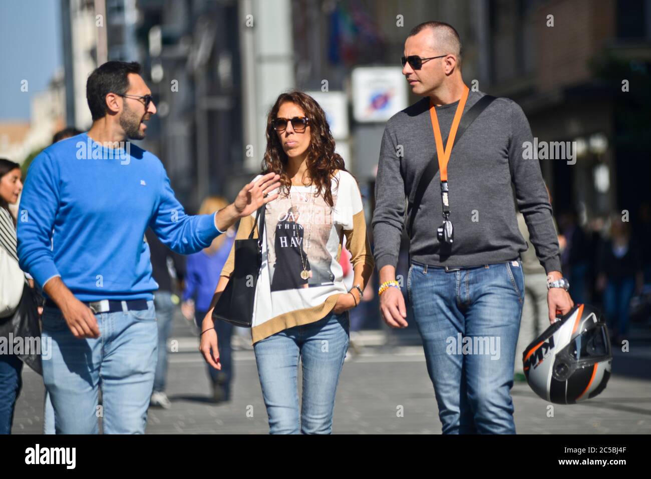 Italian friends walking and talking in Via Sparano da Bari. Bari, Italy ...