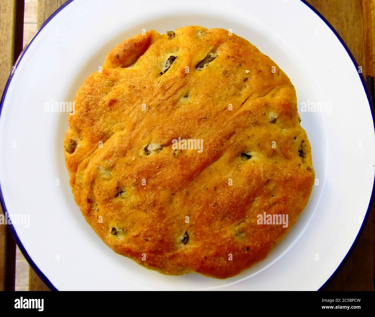 Black Olive Bread from Crete, Greece Stock Photo - Alamy
