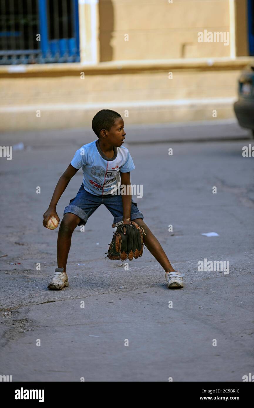 Young hispanic boy play catch hi-res stock photography and images - Alamy
