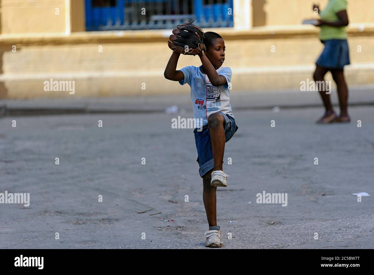 Young boy practising baseball on Cuba Street, Havana Cuba Stock Photo ...