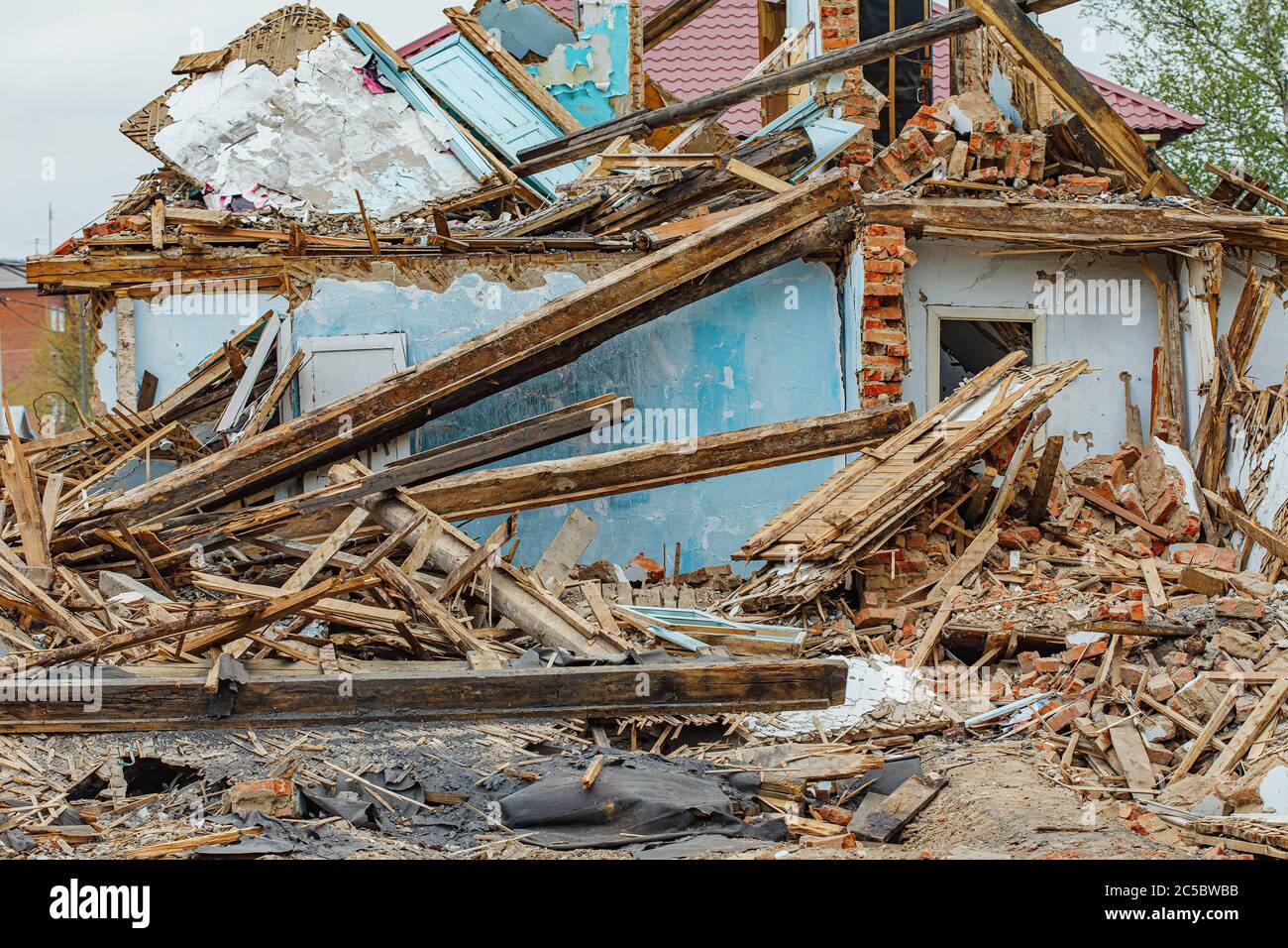 Rubble of old ruined house. Pile of construction fragments in ruins ...