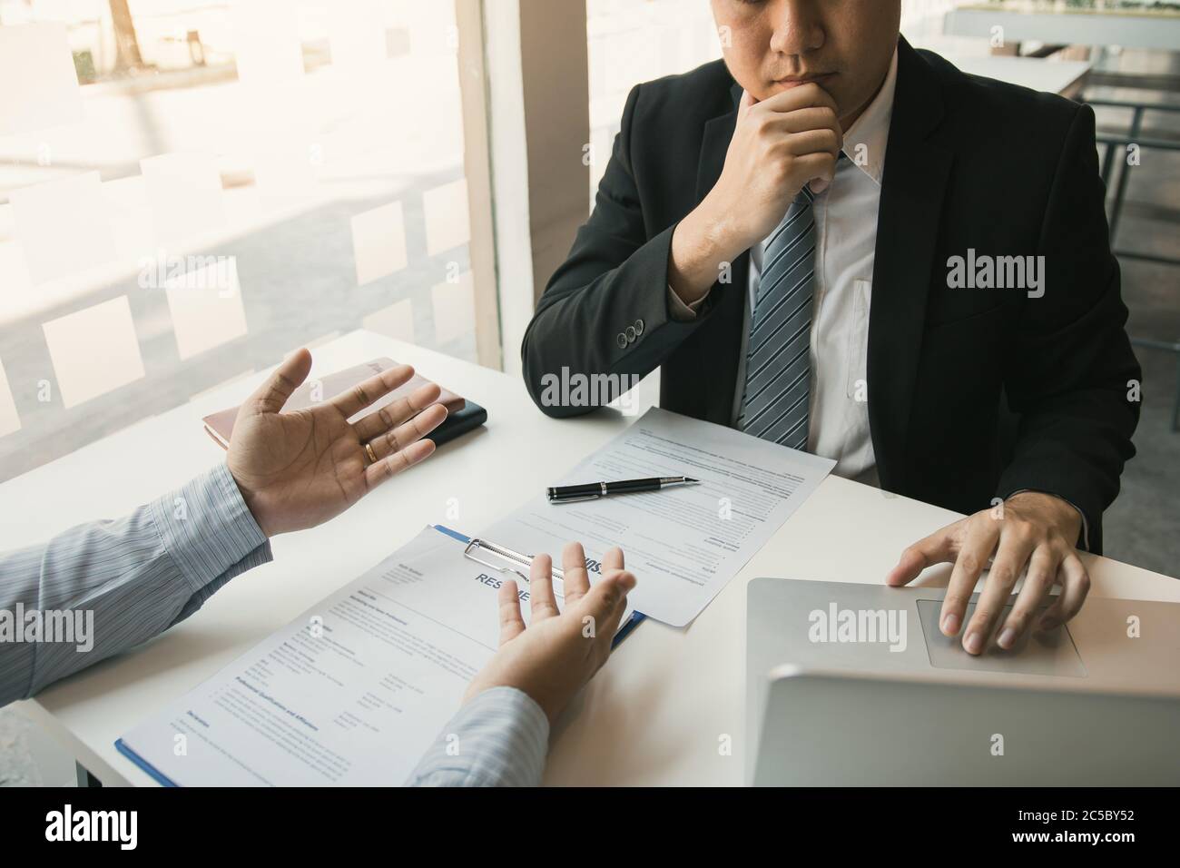 Employees are explaining about their past work experience for job ...