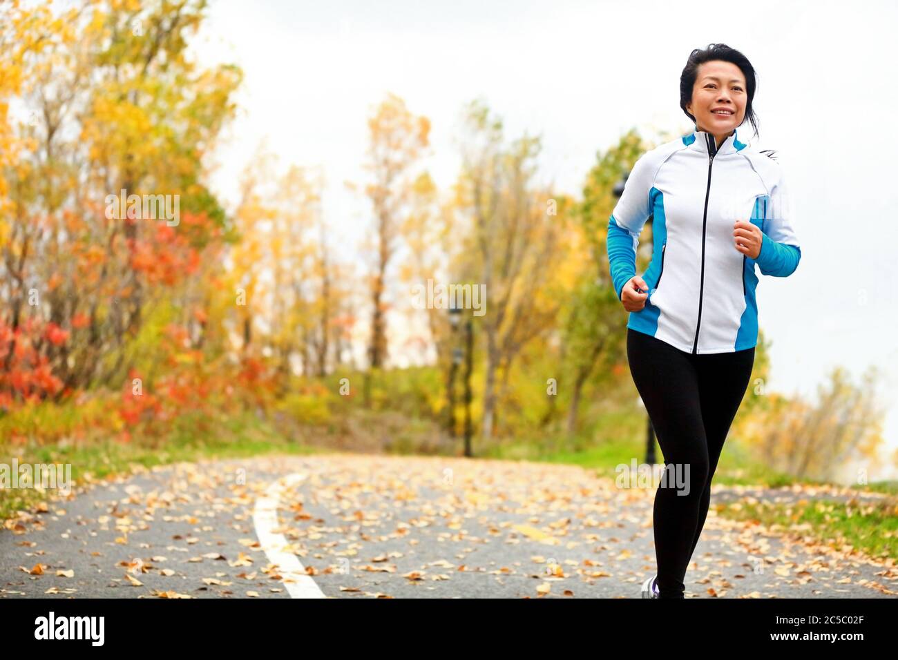 Beautiful girl marathon runner hi-res stock photography and images - Alamy