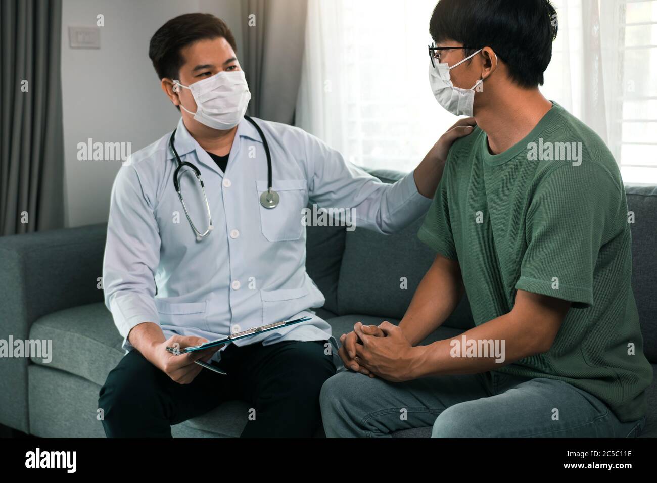 Doctor visit patients at home and follow-up the results treatment while ...