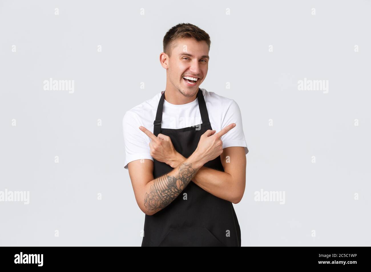 Small business owners, coffee shop and staff concept. Excited handsome ...