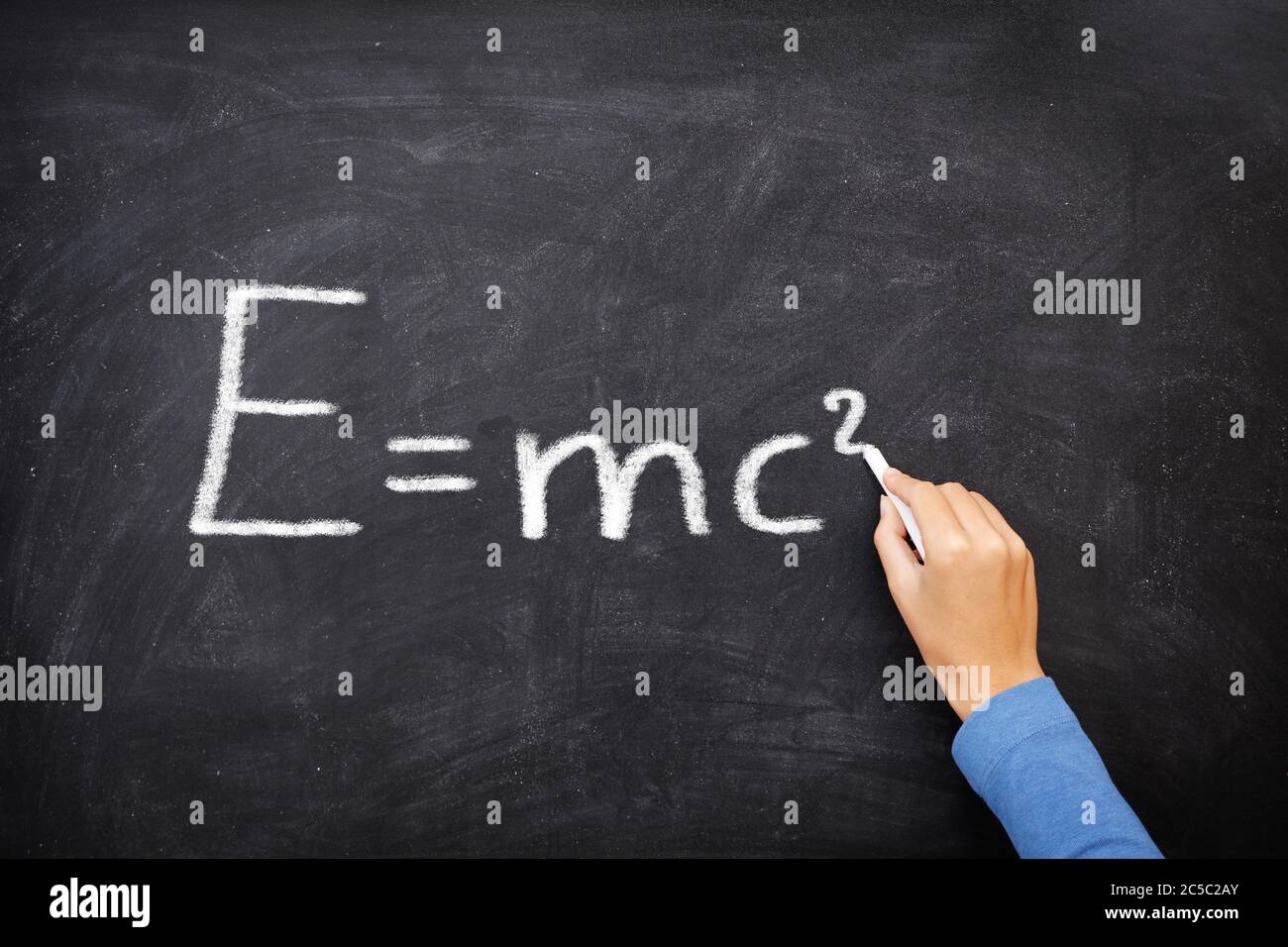 physics science formula equation blackboard, E=mcÂ². EMC2 written on ...