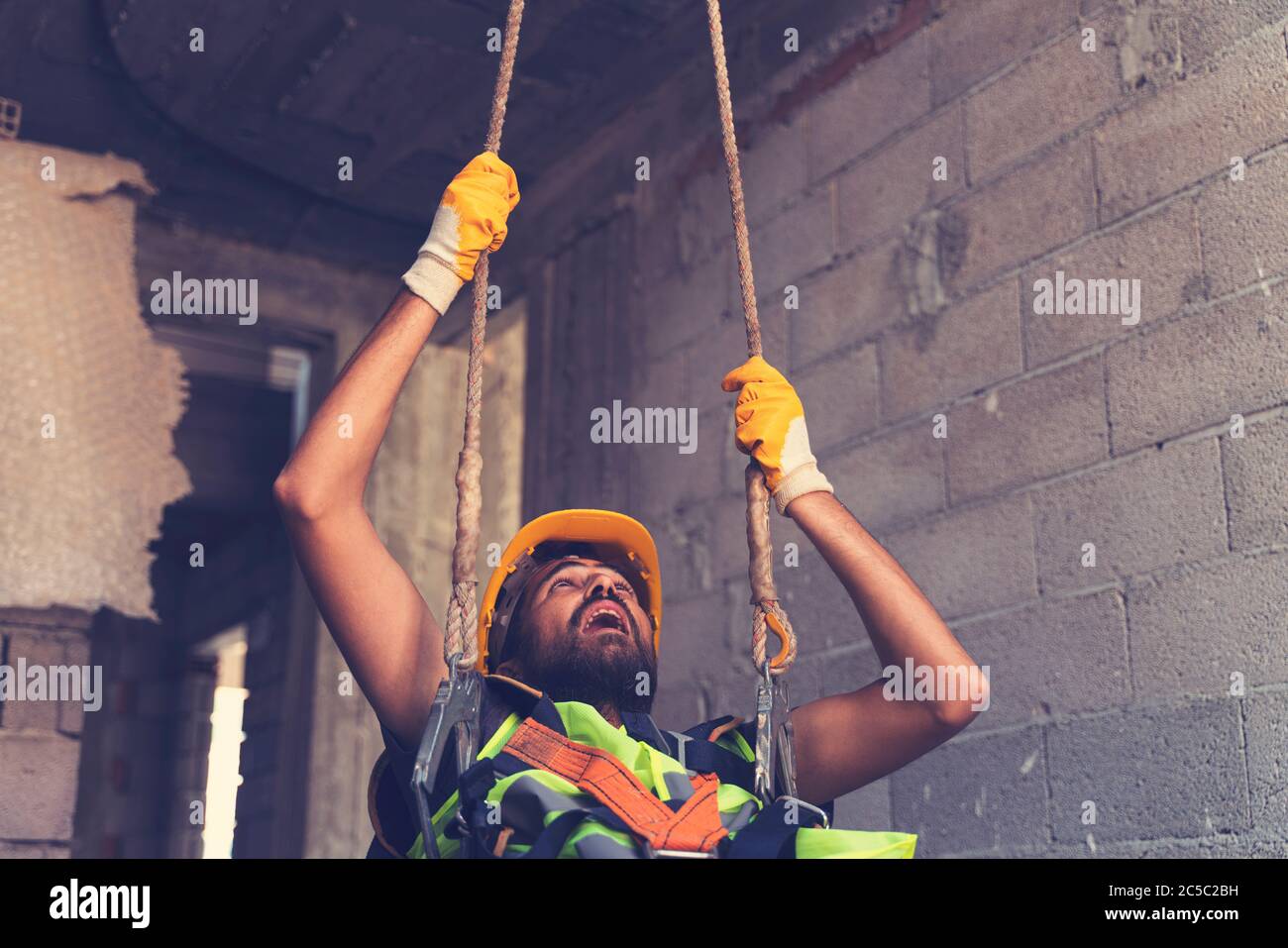 Work safety saves your life. Construction worker falls Stock Photo - Alamy