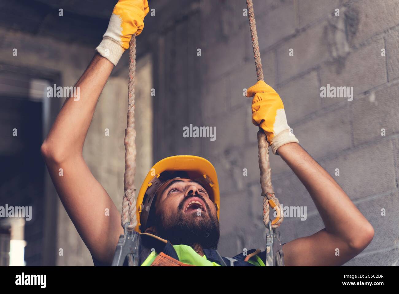 Work safety saves your life. Construction worker falls Stock Photo - Alamy