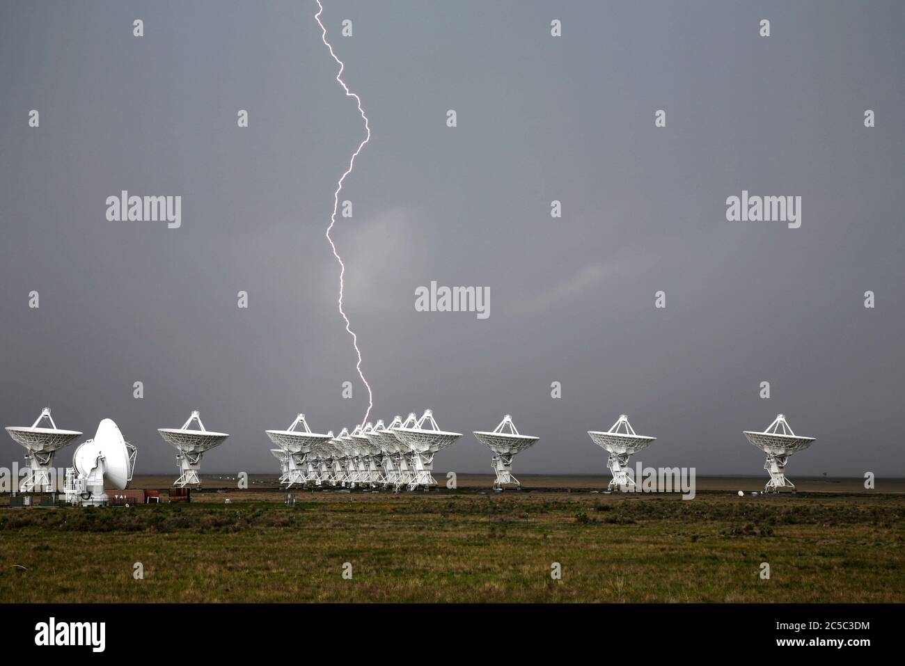 Lightning strikes near a group of radio telescopes at the Very Large ...