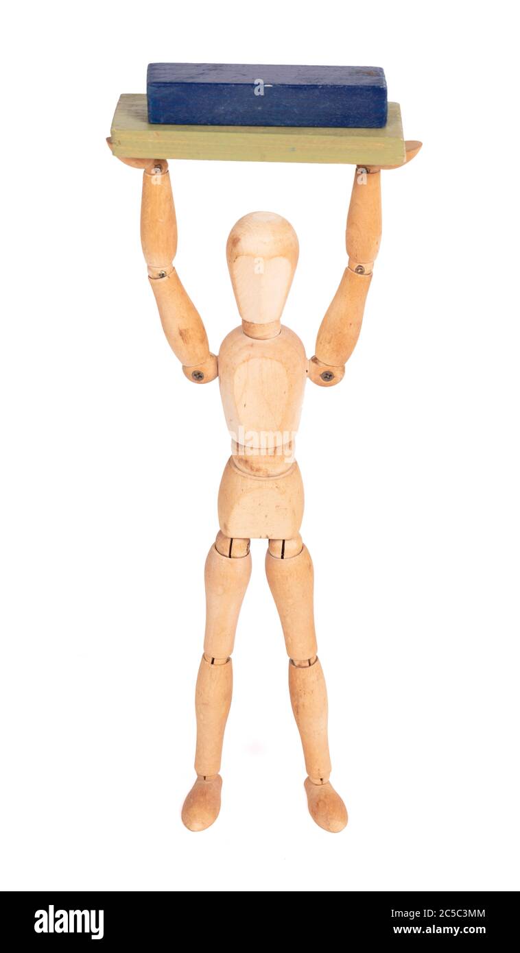 Wooden mannequin carrying wooden blocks, isolated on white Stock Photo ...
