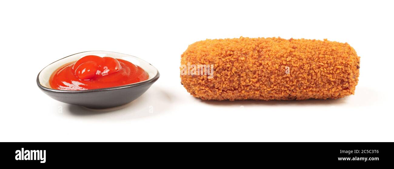 Brown crusty dutch kroket with ketchup isolated on a white background ...