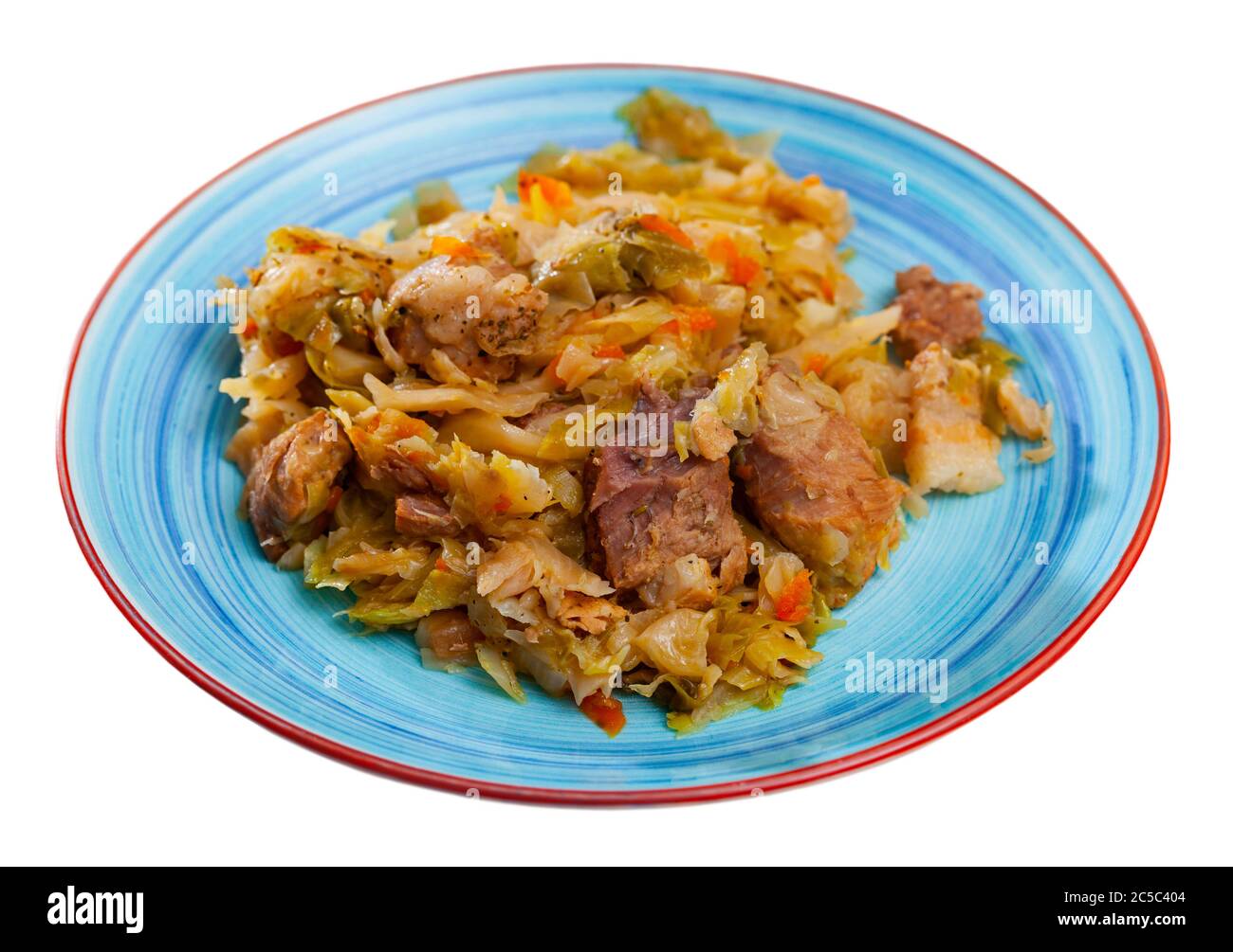 Home style stew of cabbage with pieces of pork. Traditional Ukrainian ...