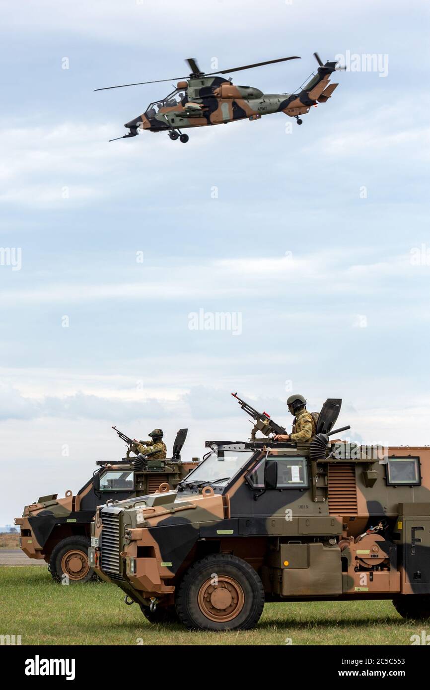 Two Australian Army Bushmaster armoured Personnel carriers (APC) with ...