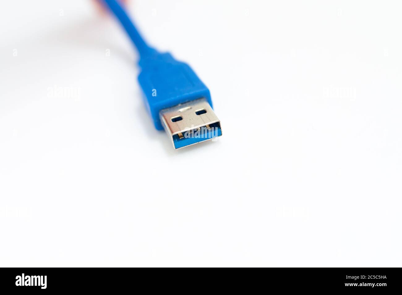 blue usb cable on white background Stock Photo - Alamy