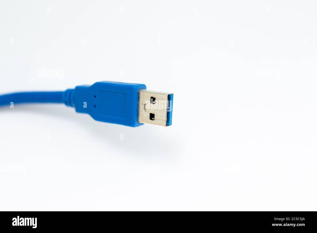 blue usb cable on white background Stock Photo - Alamy