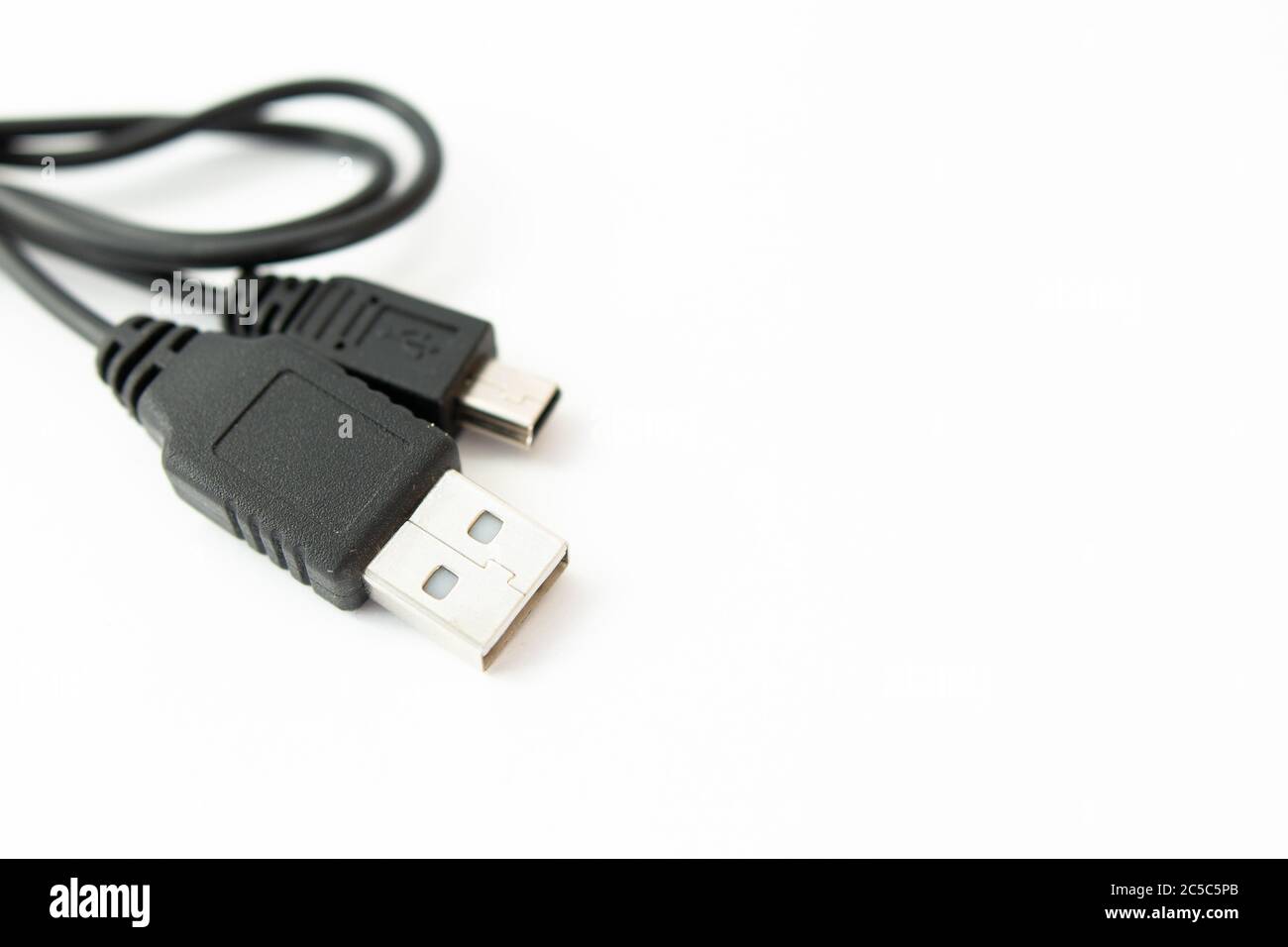 black usb cable on white background Stock Photo - Alamy