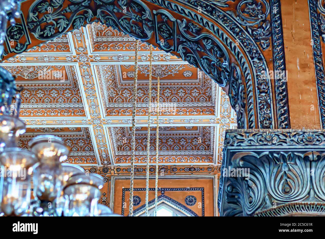 The ornate and intricate stucco work and floral carvings adorn the roof ...