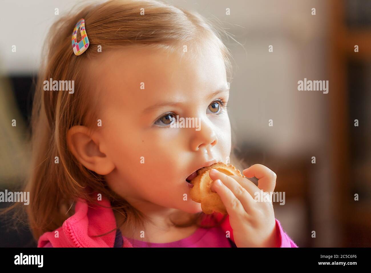 Child eating cookies hi-res stock photography and images - Alamy