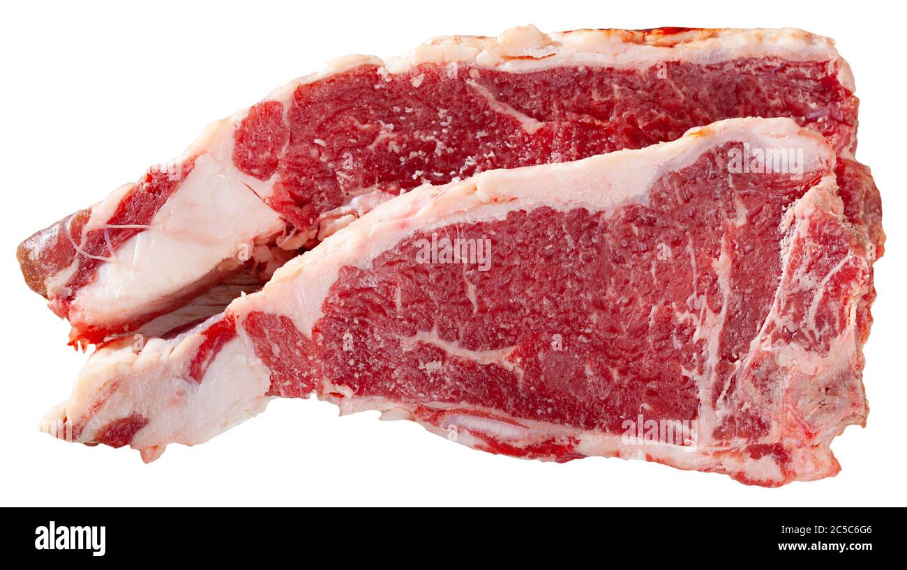 Ingredients for cooking. Fresh raw beef entrecote. Isolated over white ...