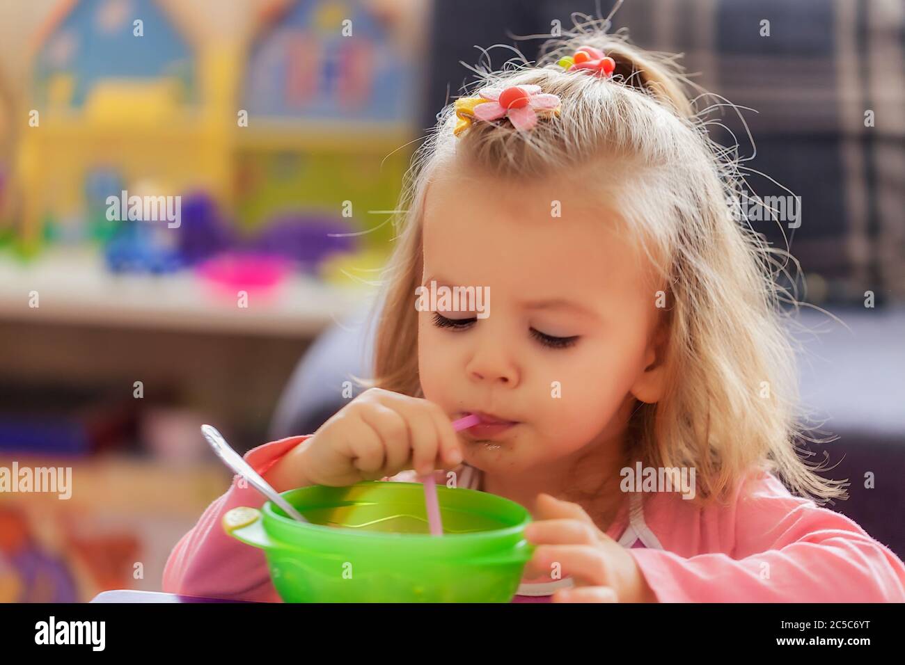 a child has breakfast, note shallow depth of field Stock Photo - Alamy