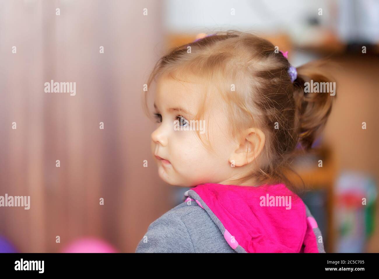 image of a child from profile while watched tv, note shallow depth of ...