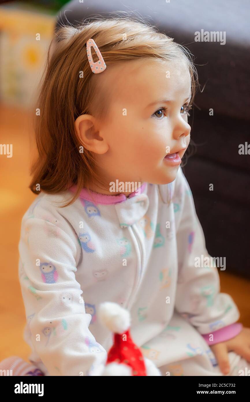 image of a child from profile while watched tv, note shallow depth of ...