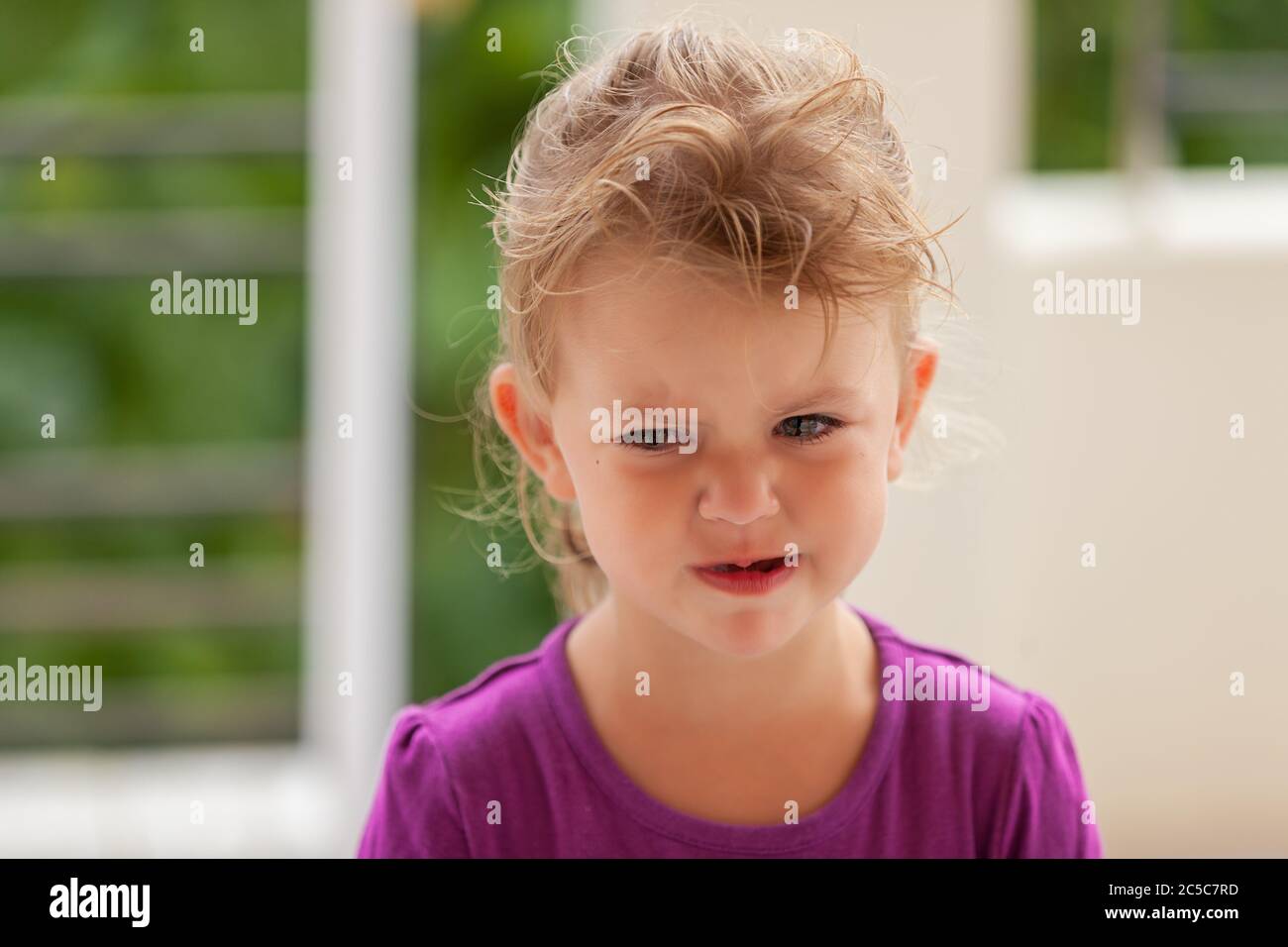 the little girl is angry and crying Stock Photo - Alamy