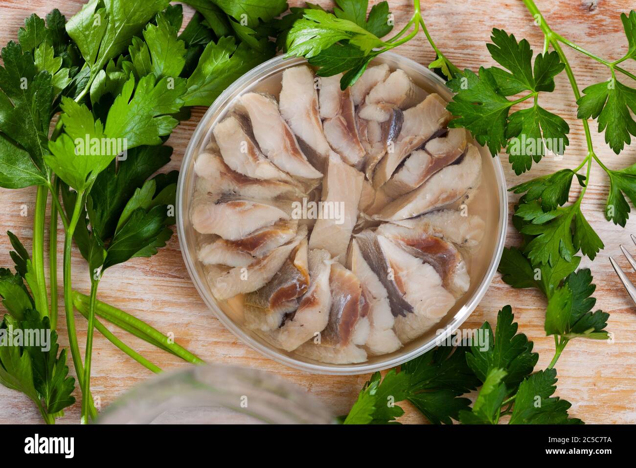 Preserved sardines marinated in oil in plastic container Stock Photo ...