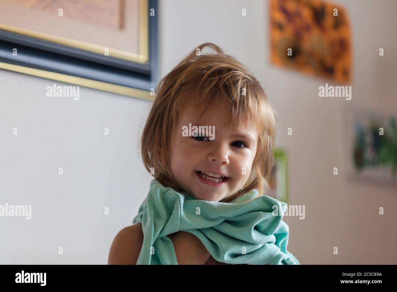 Child getting dressed alone hi-res stock photography and images - Alamy