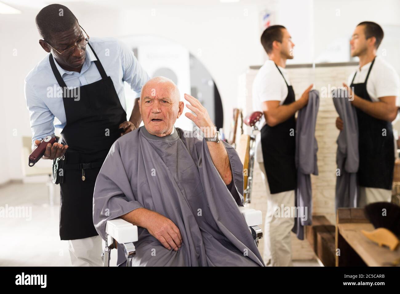 Male hairdresser angry hi-res stock photography and images - Alamy