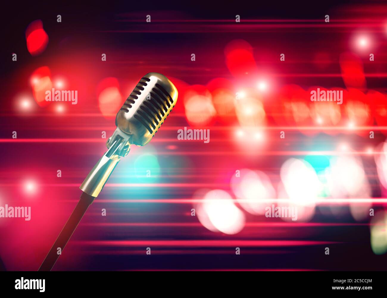 Microphone on stage Stock Photo - Alamy