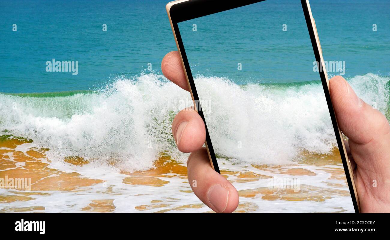 Surf waves on smartphone screen. Clear sea water. Stormy sea Stock ...