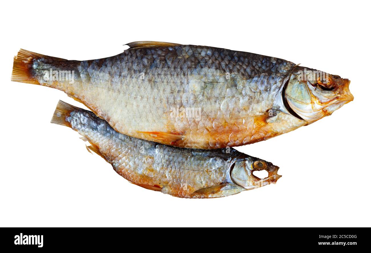 Dried salted roach fish on wooden table, top view﻿. Isolated over white ...