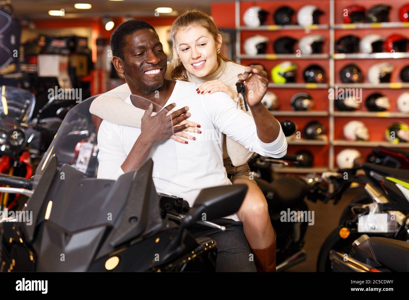 Couple posing on motorcycle hi-res stock photography and images - Alamy