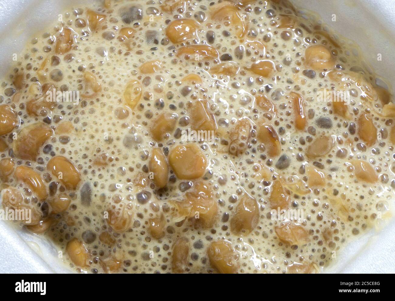 closeup japanese natto fermented soybeans in pack Stock Photo - Alamy