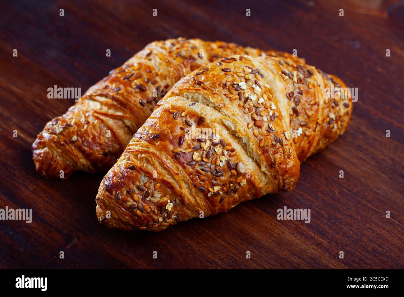 Fresh tasty multigrain croissants on table in kitchen, nobody Stock ...