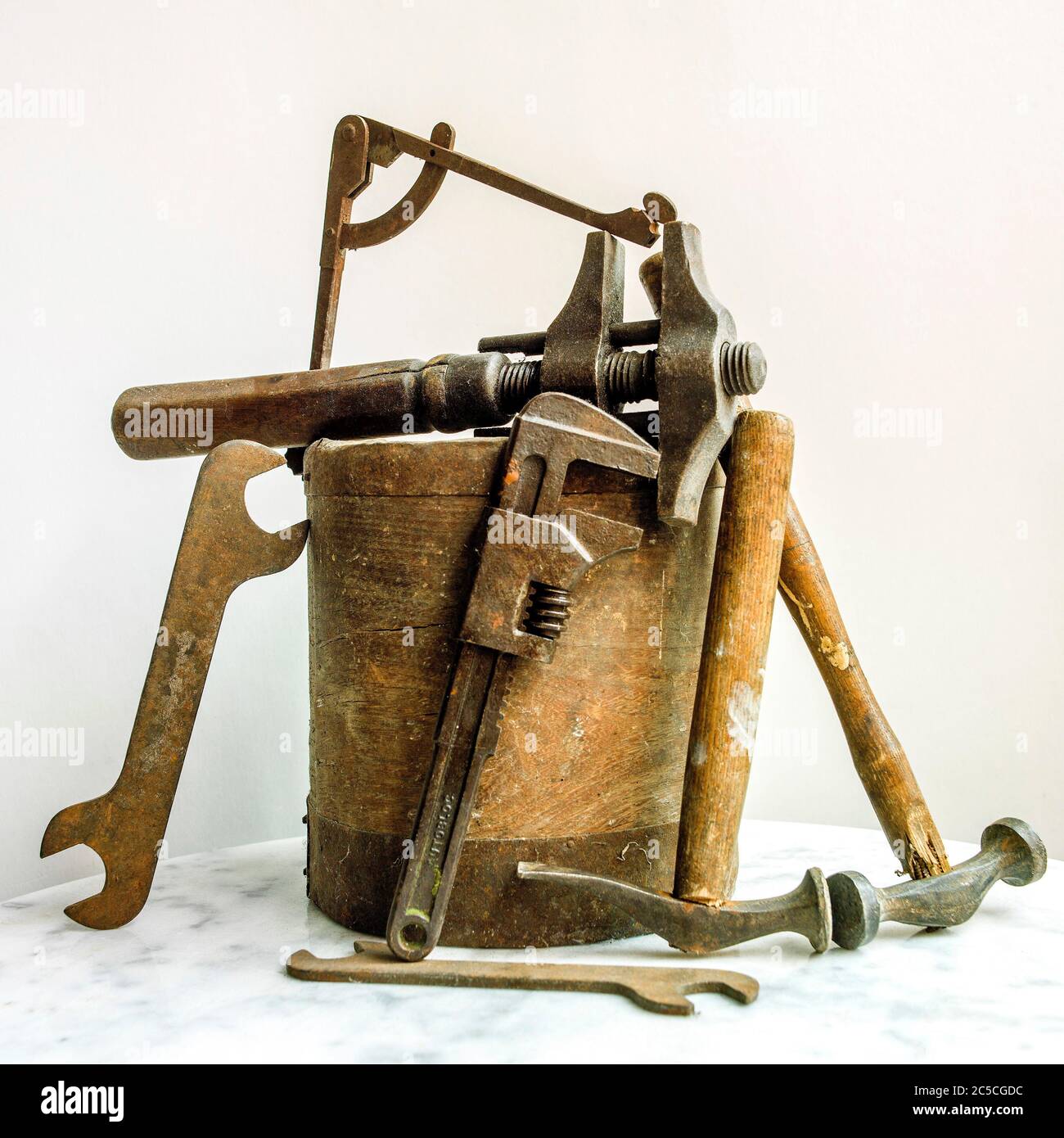 Variety of old tools on a white background Stock Photo - Alamy