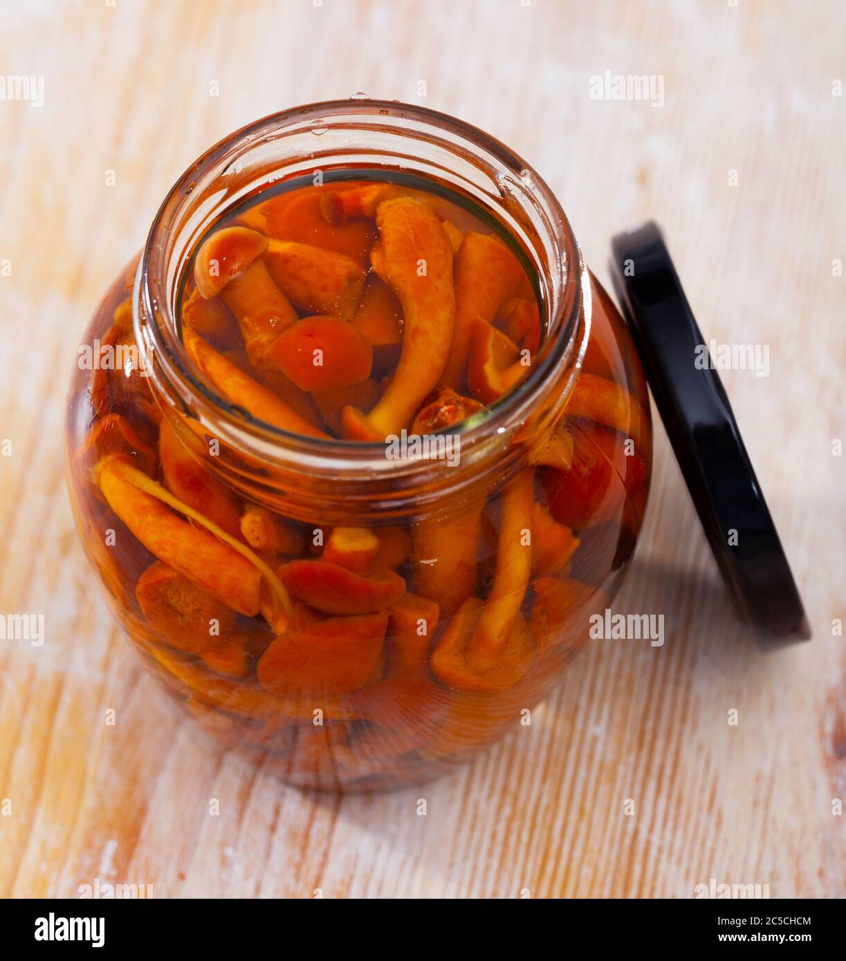 Glass jar of marinated mushrooms nameko Stock Photo - Alamy