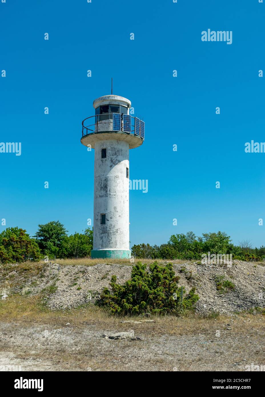 summer view of an old abandoned lighthouse by the sea, Saaremaa Island ...