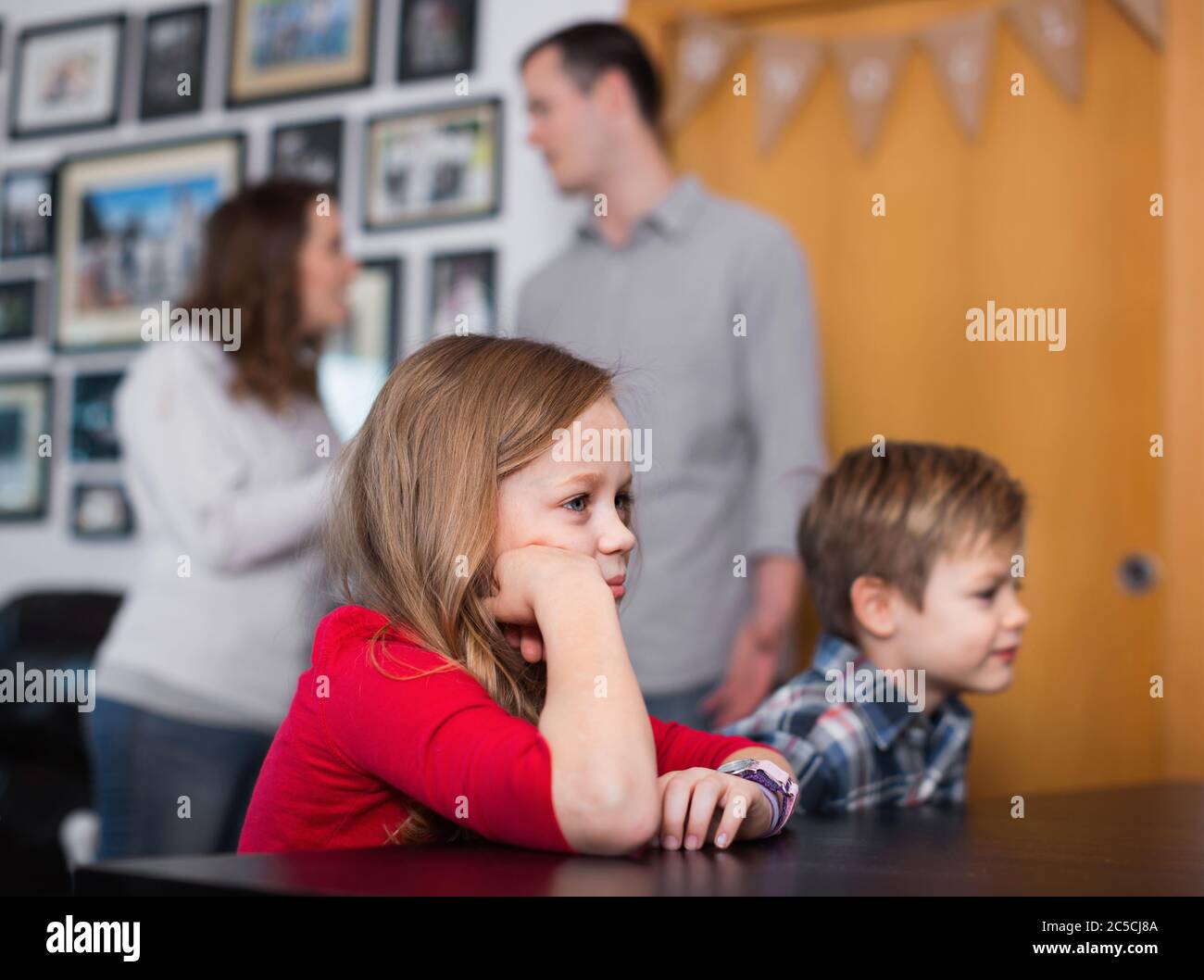 Young angry parents having bad row while their children at home Stock ... Young angry parents having bad row while their children at home Stock ...