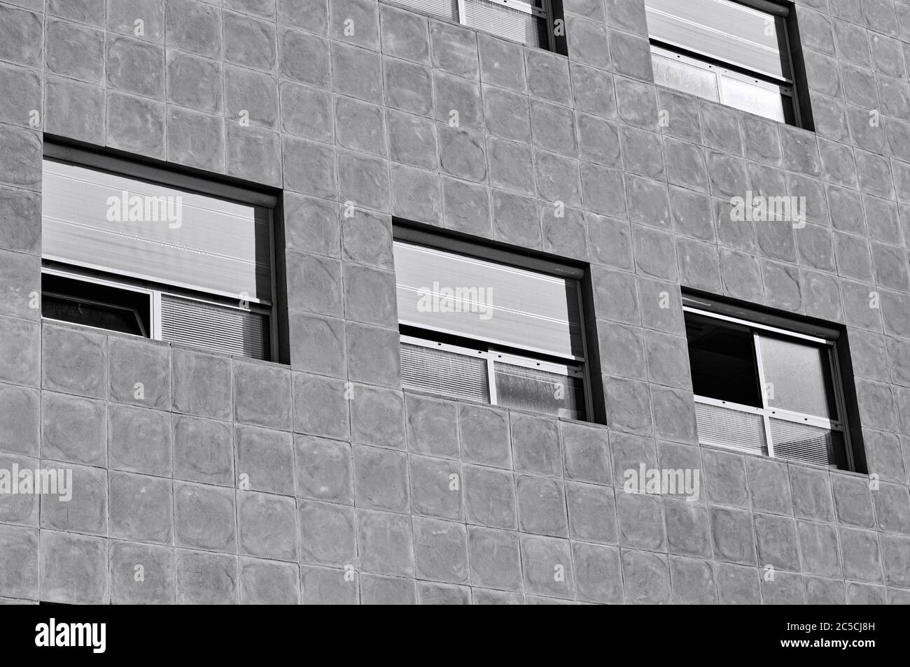Rectangular windows of a modern building with terracotta walls (Pesaro ...
