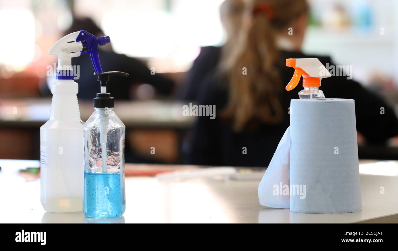 Covid safe school. Inside a classroom with cleaning products on display ...