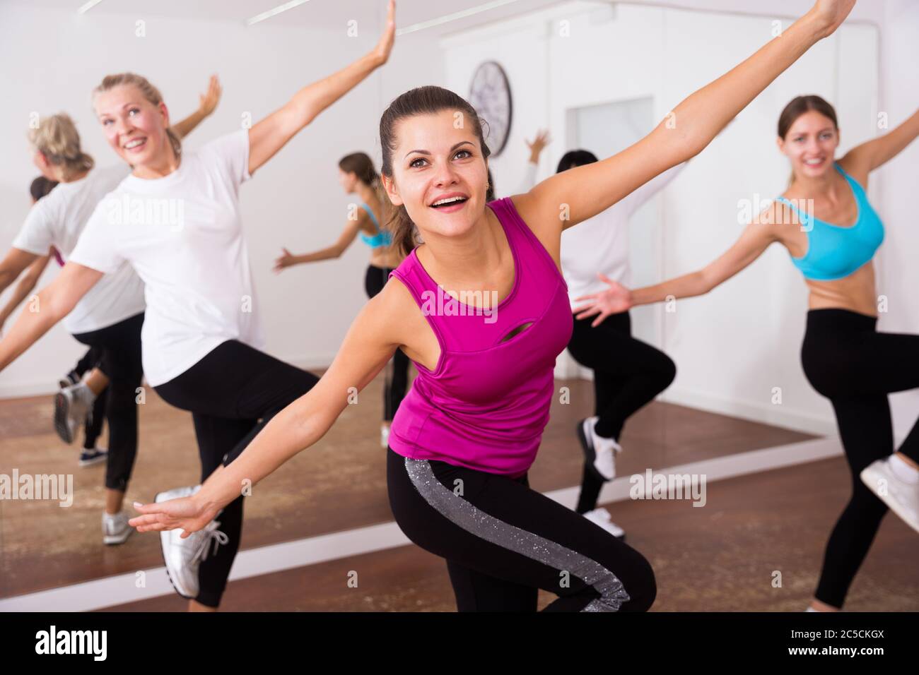 Women dancing aerobics at lesson in the dance class Stock Photo - Alamy