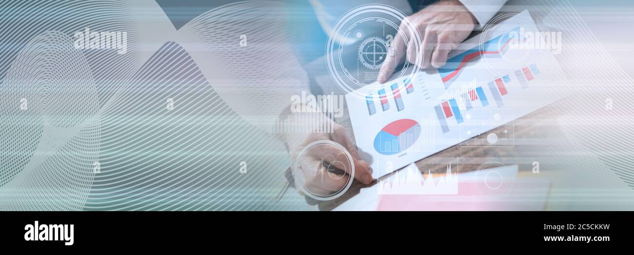 Businessman analyzing financial paperwork, double exposure, light ...