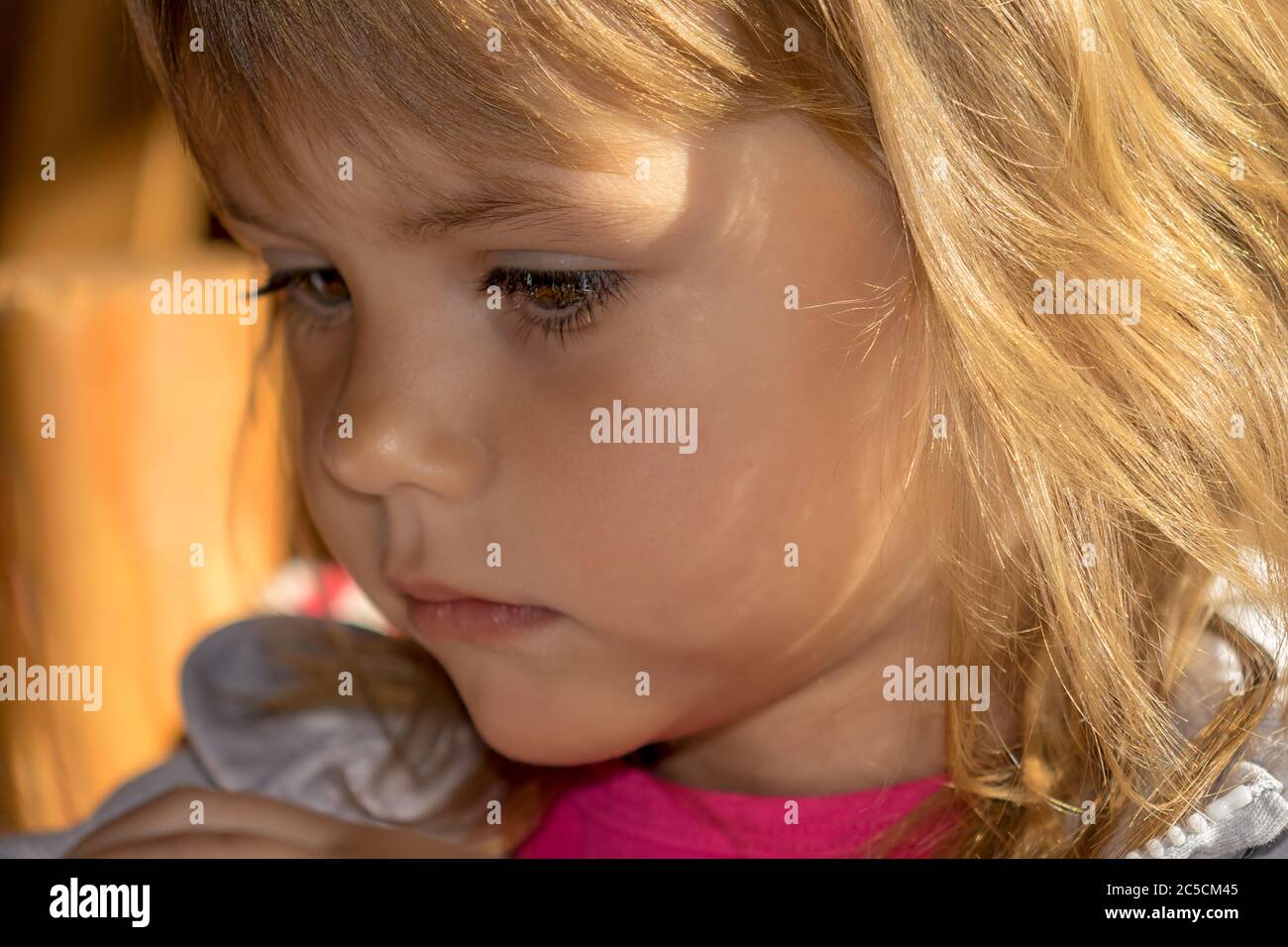 children's face expression until it pays attention Stock Photo - Alamy