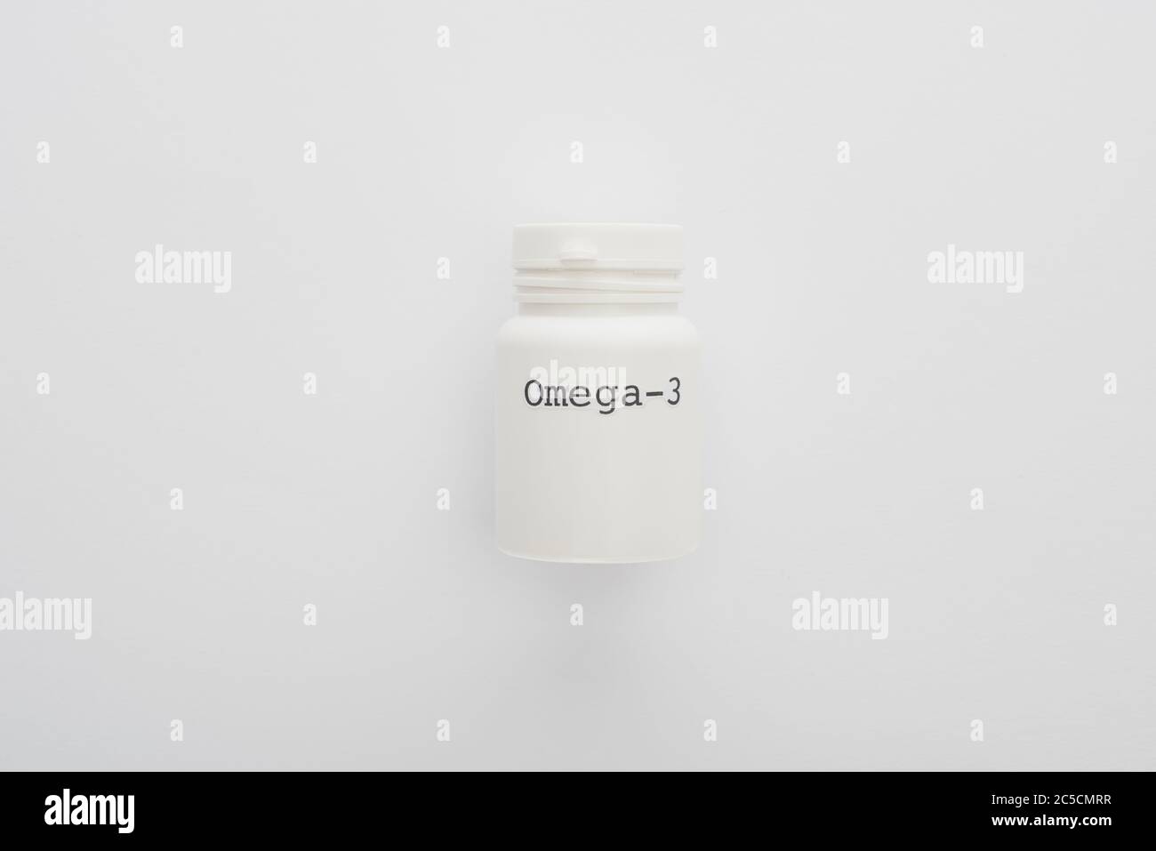 Top view of container with omega-3 lettering on white background Stock ...