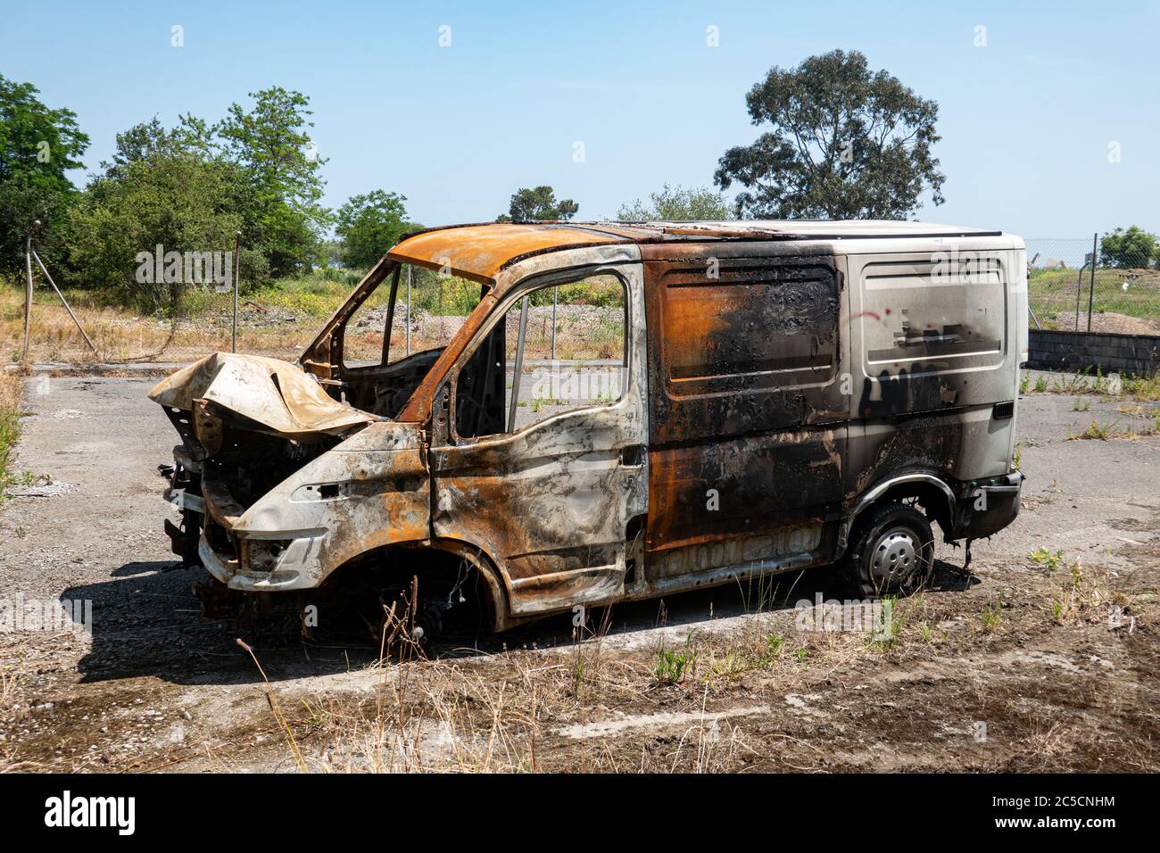 burnt out van Stock Photo - Alamy