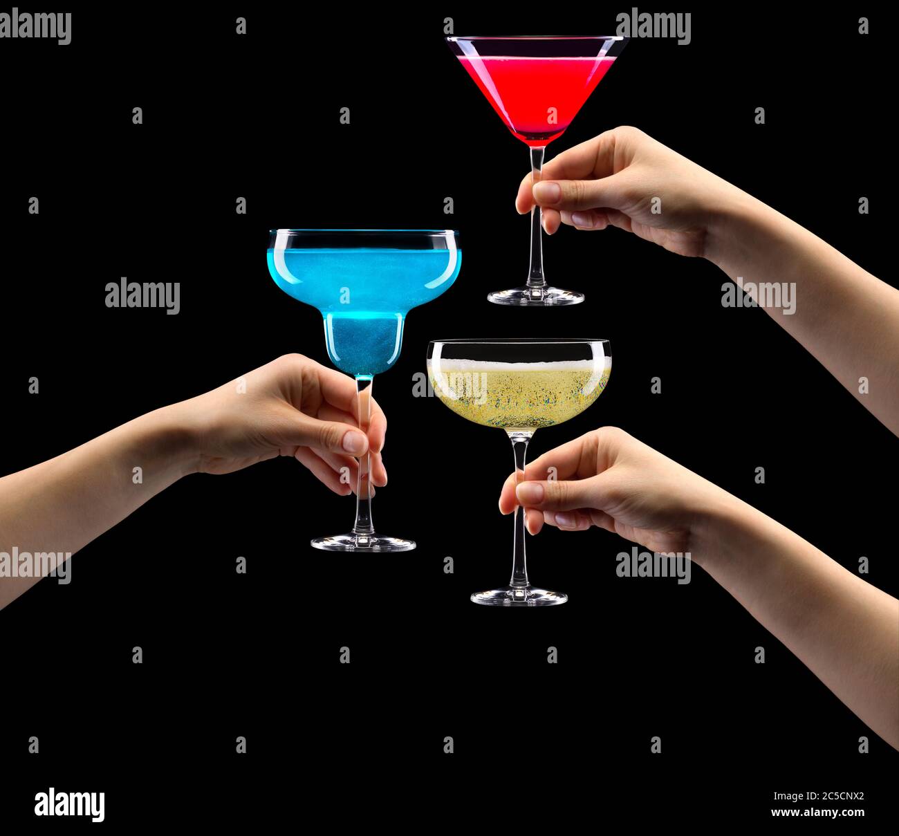 Set of hands holding cocktails isolated on black background Stock Photo ...